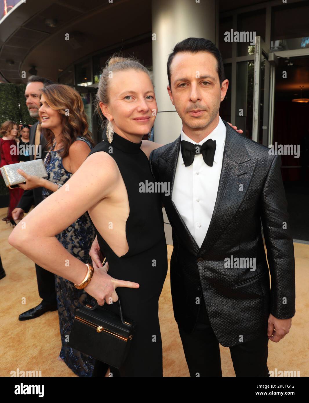 Emma Wall, left, and Jeremy Strong arrive at the 74th Emmy Awards on ...