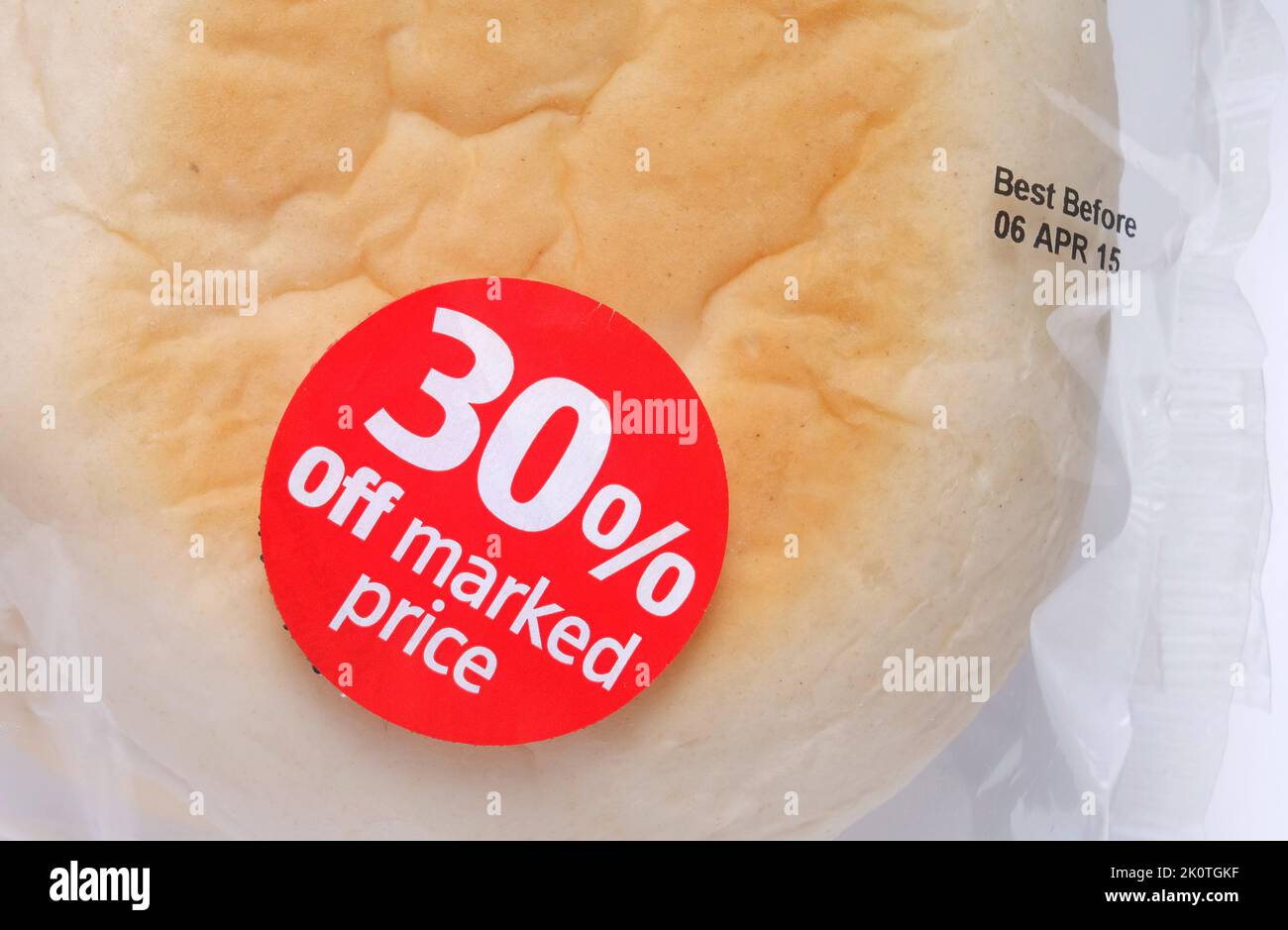 Discount sticker attached to cellophane bread packaging. 30 per cent ...