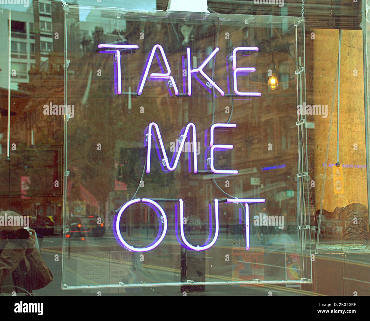 Take me out neon sign Glasgow, Scotland, UK Stock Photo - Alamy
