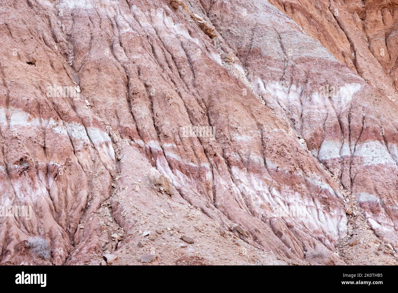 Colorful striations cutting through the sandstone hills creating ...