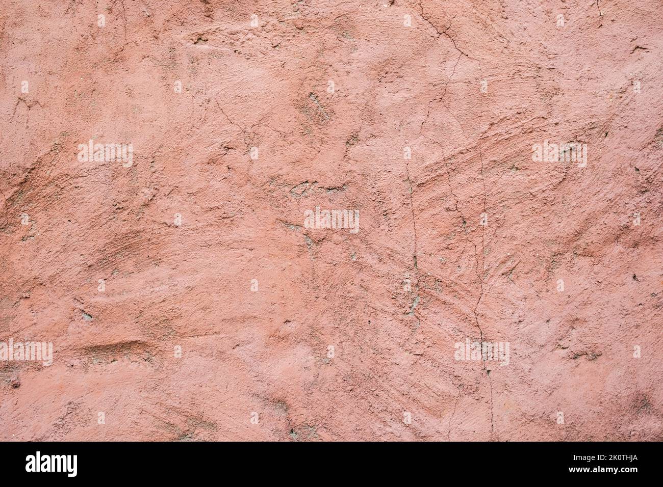 Dusty pink rose texture of concrete. An old concrete wall painted with ...