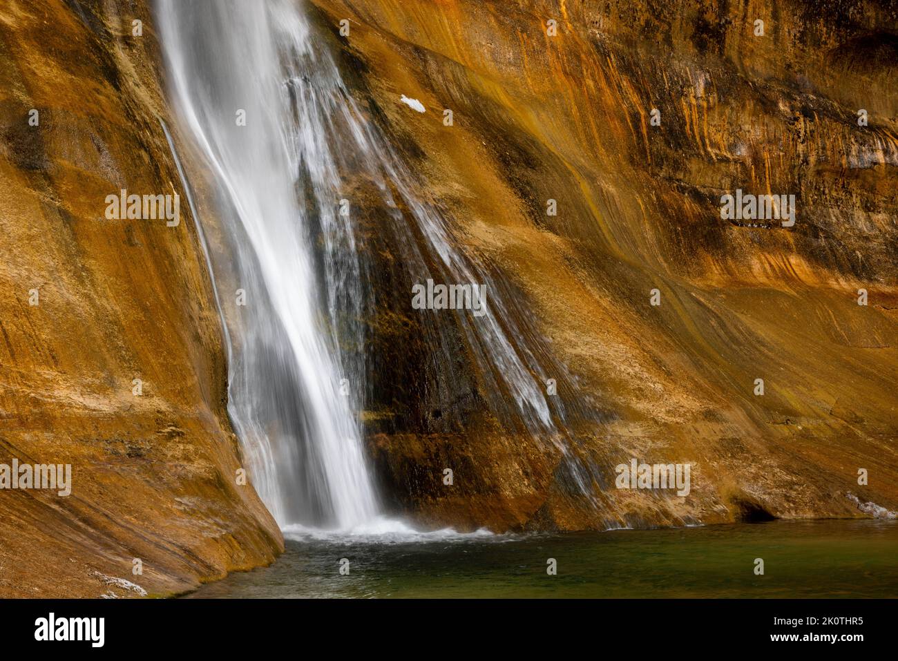 The base of Lower Calf Creek Falls pouring into the pool below. Grand ...