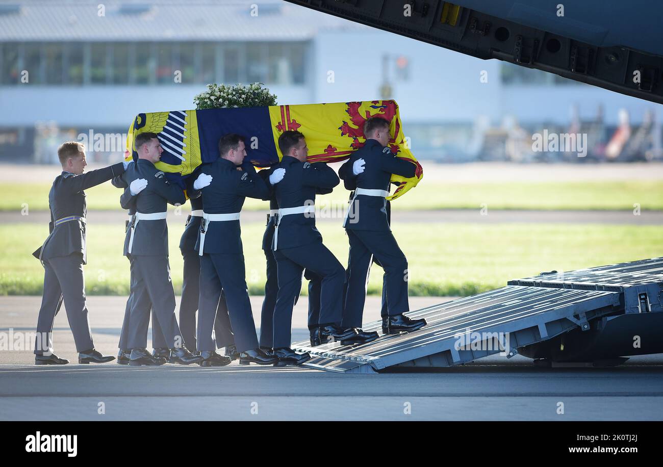 A Royal Air Force bearer party carry the coffin of Queen Elizabeth II ...