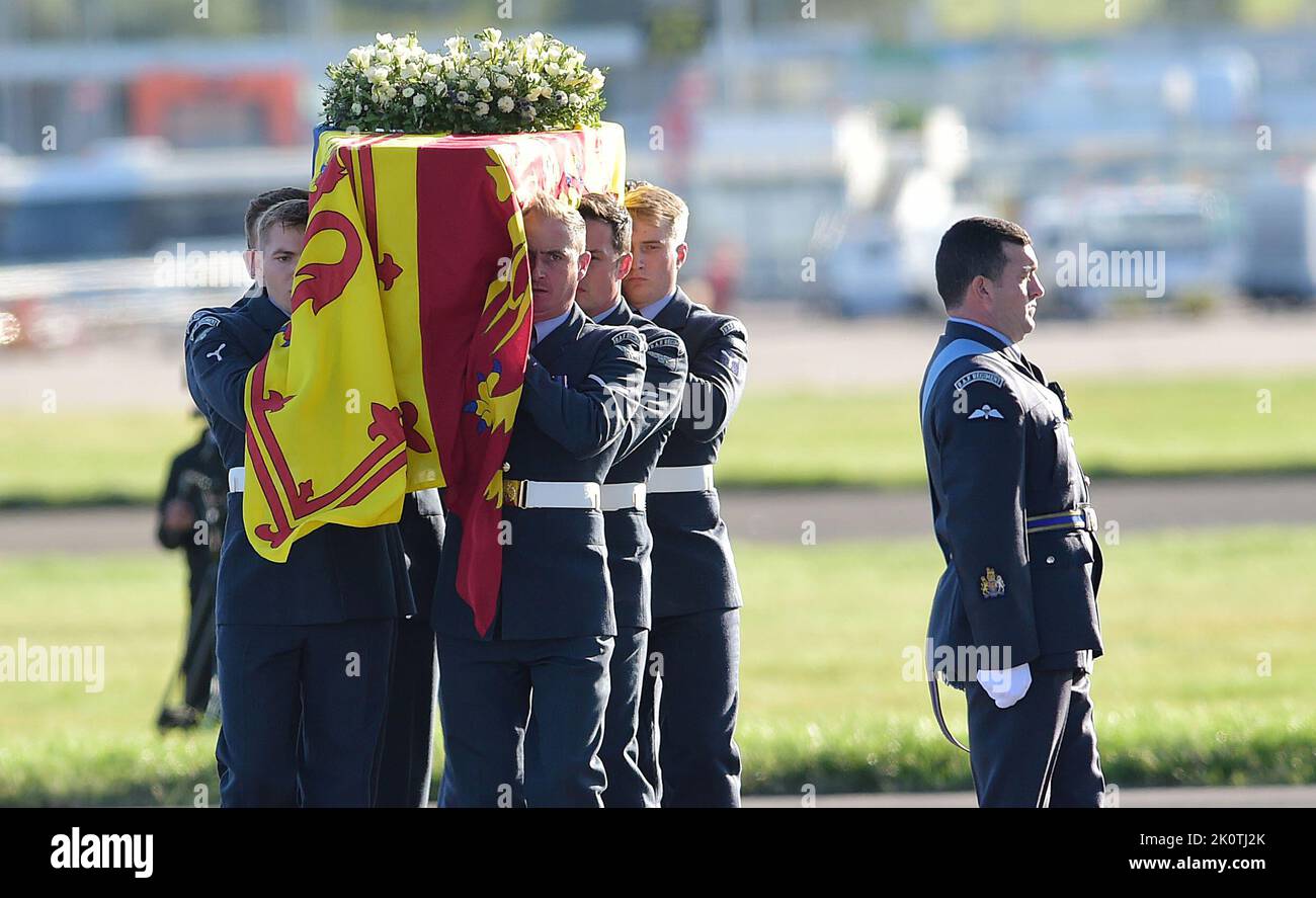 A Royal Air Force bearer party carry the coffin of Queen Elizabeth II ...