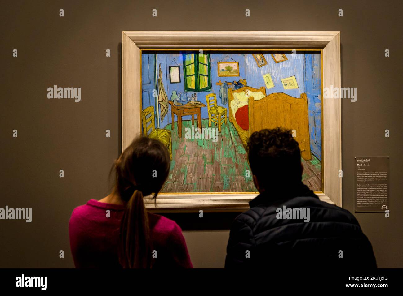 Visitors looking at Vincent van Gogh painting The Bedroom, 1889, The ...