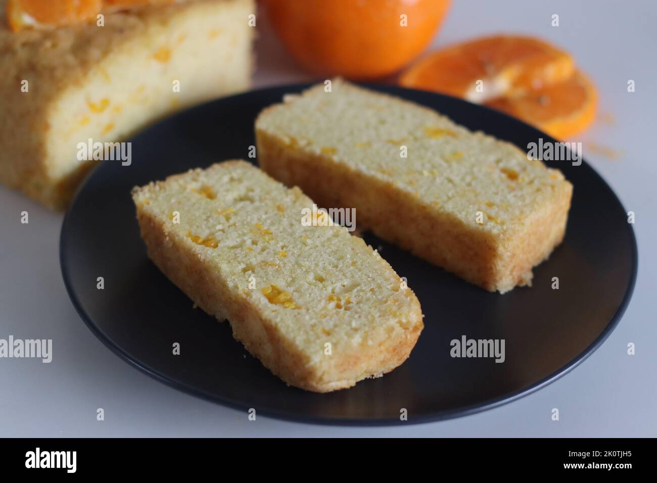 Orange cake. Tea time cake with orange juice and orange pulp. Shot ...