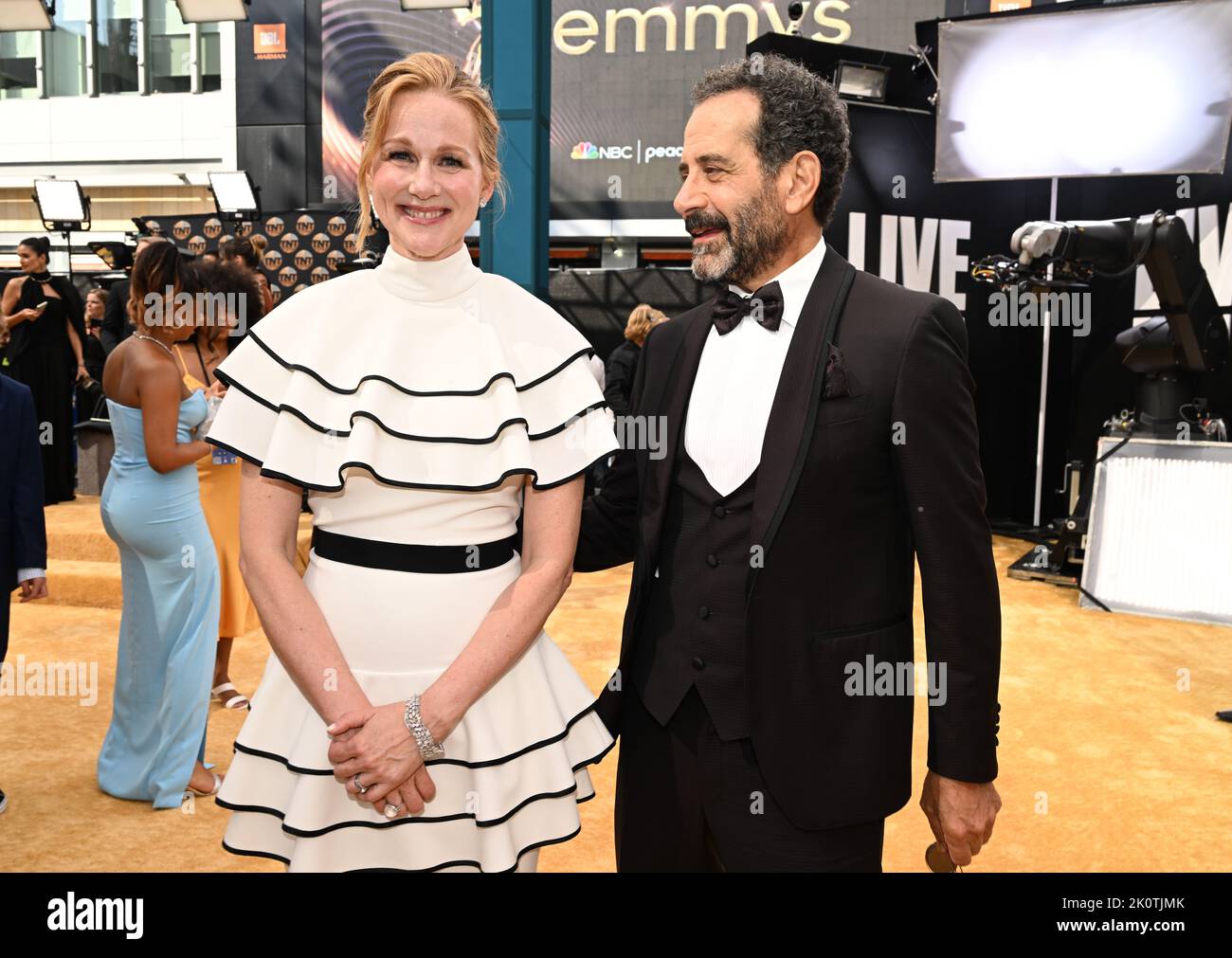 Laura Linney, left, and Tony Shalhoub arrives at the 74th Emmy Awards ...
