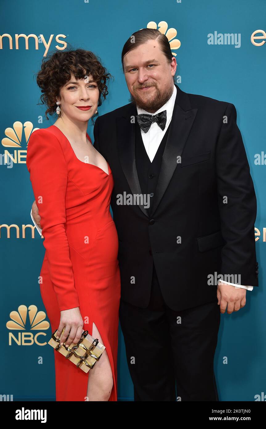 Jen Tullock, left, and Michael Chernus arrive at the 74th Emmy Awards ...