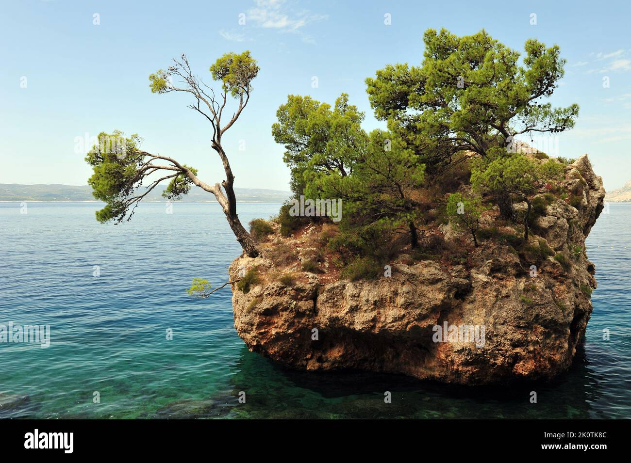 Symbol of Brela. Tiny rock island with trees Stock Photo - Alamy