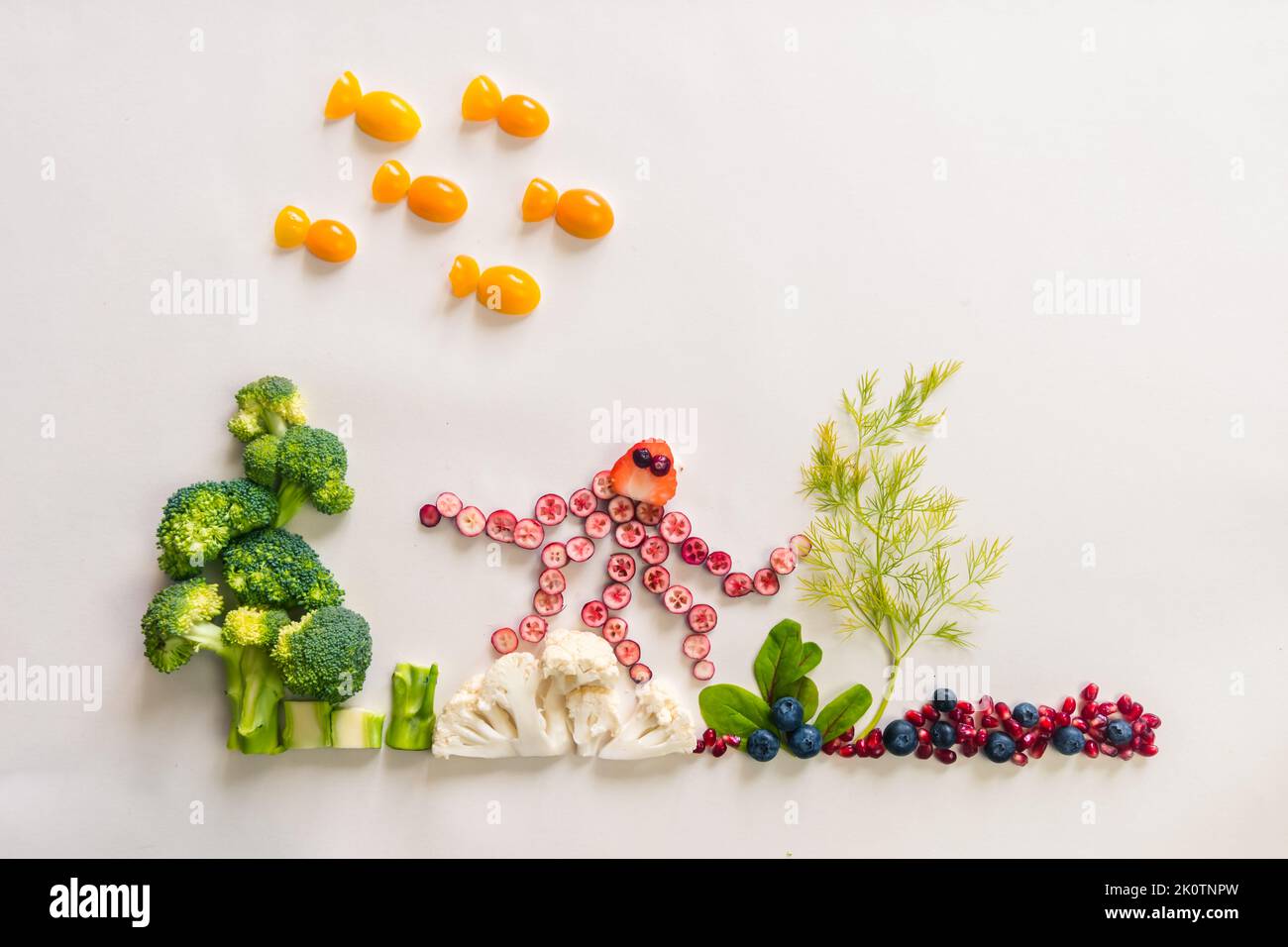 octopus made from red fruits, fish from orange tomato with sea world ...