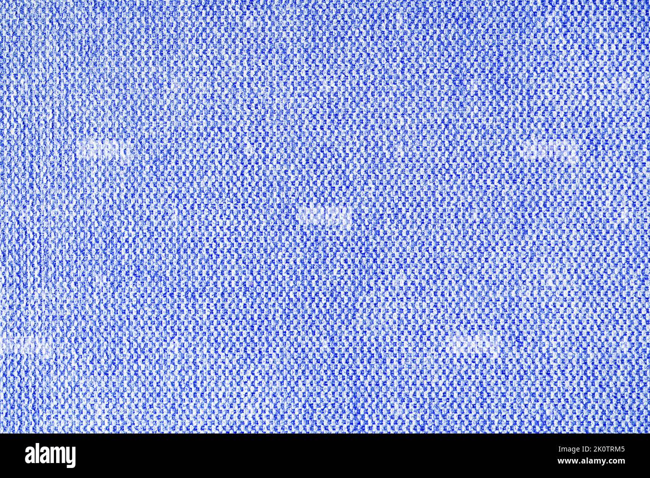 Close-up texture of natural blue coarse weave fabric or cloth. Fabric texture of natural cotton ...