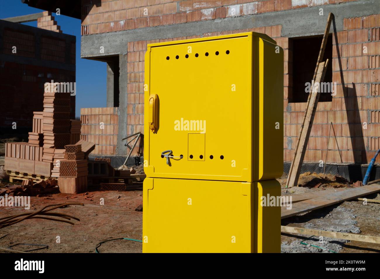 Yellow metal gas connection box at the construction site of a new ...