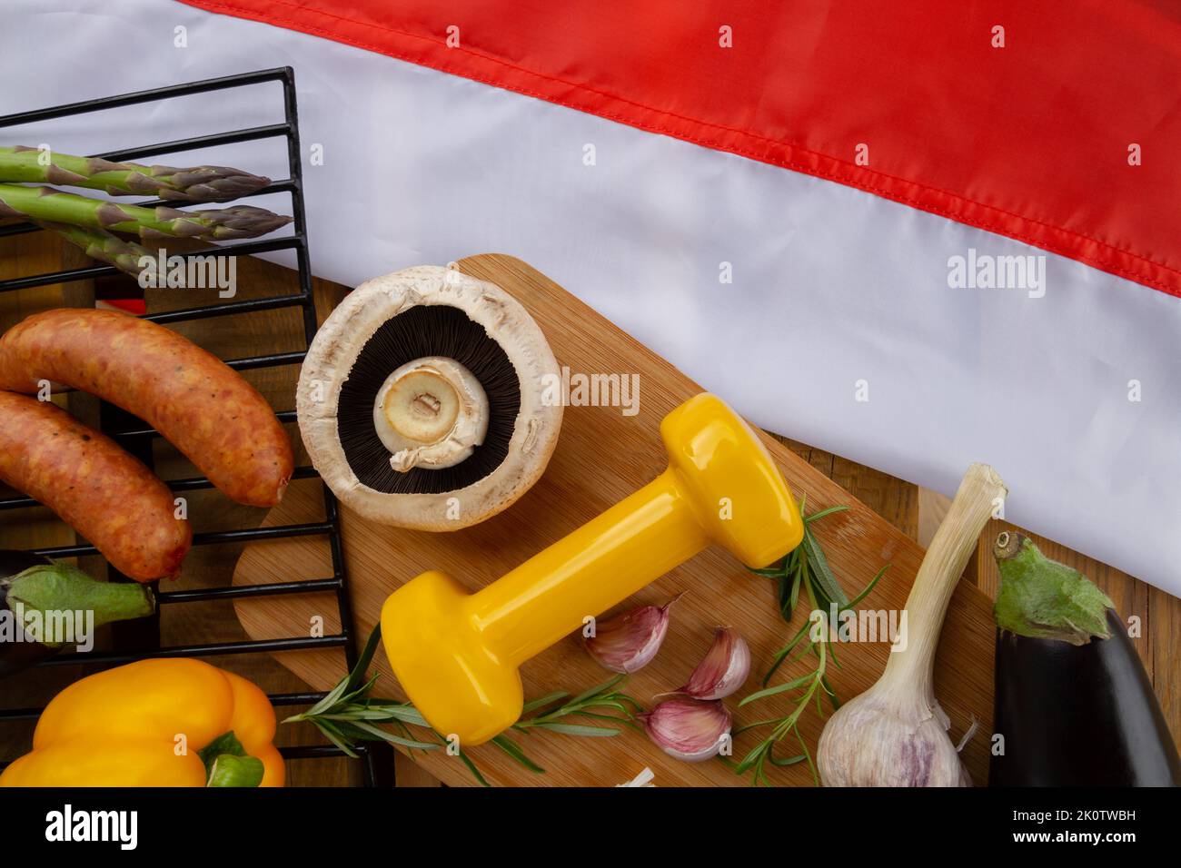 Gym dumbbells, vegetables, sausages and flag of the Republic of Poland ...