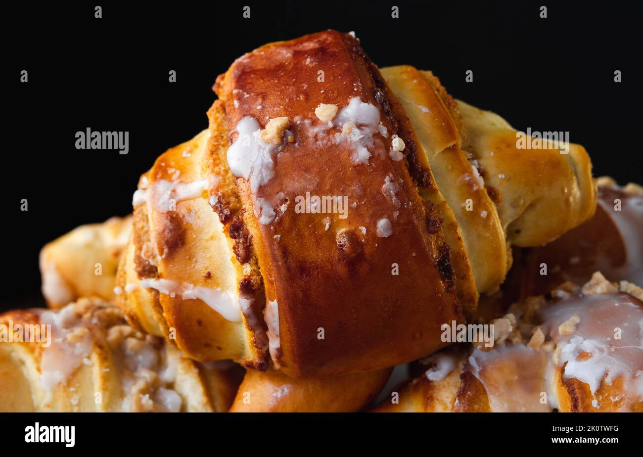 Fresh traditional polish pastry with poppy-seed filling and nuts. St ...