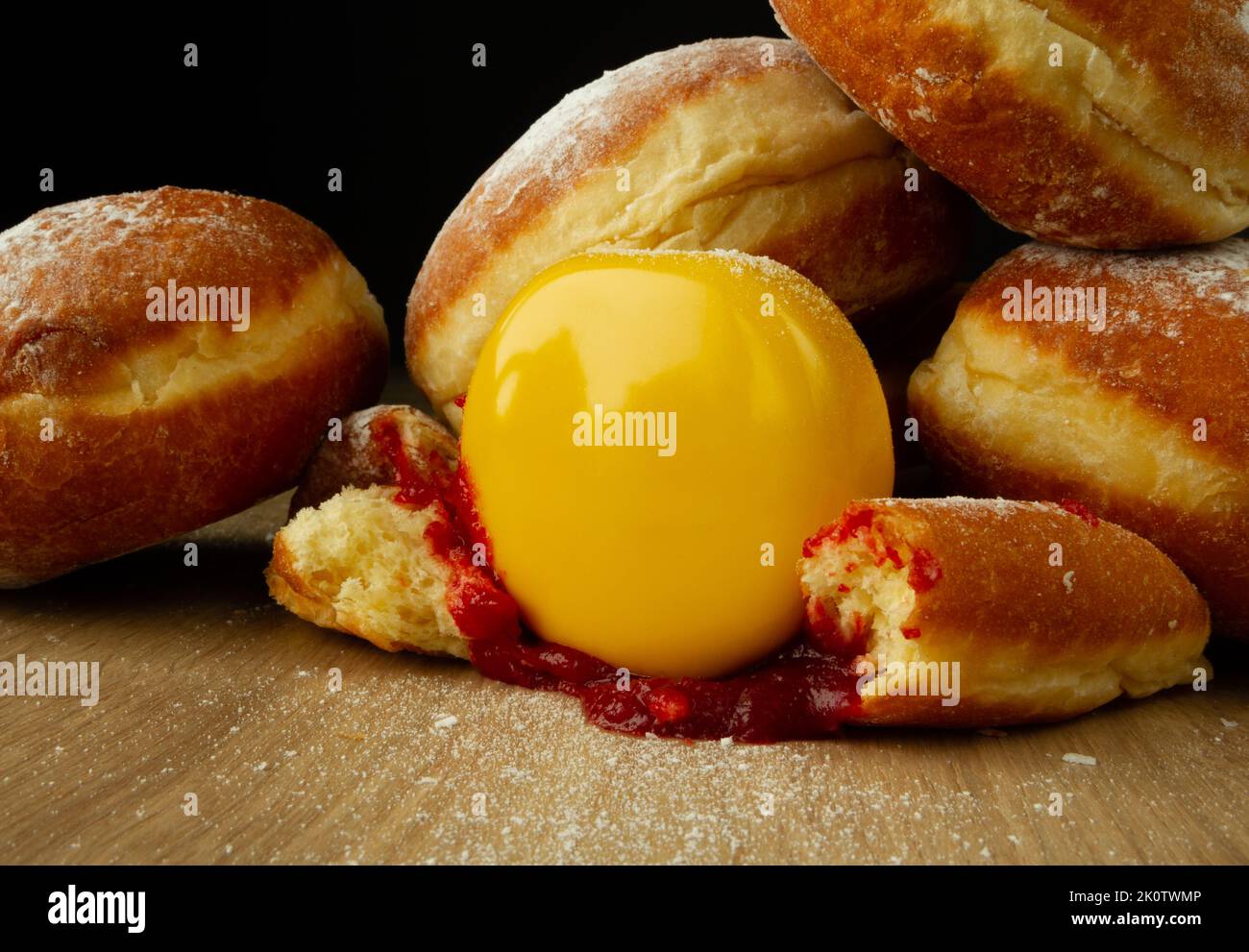 Gym dumbbell crushing Polish pączki deep-fried doughnuts. Fat Thursday ...