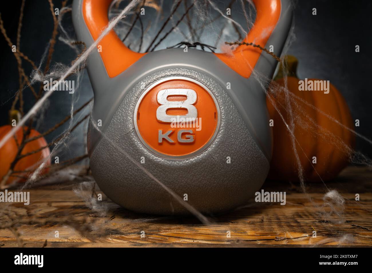 Kettlebell covered with spider web. Kettle bell lifting exercises, gym ...