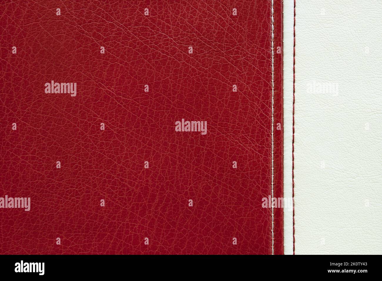 Red and white leather texture with a seam Stock Photo - Alamy