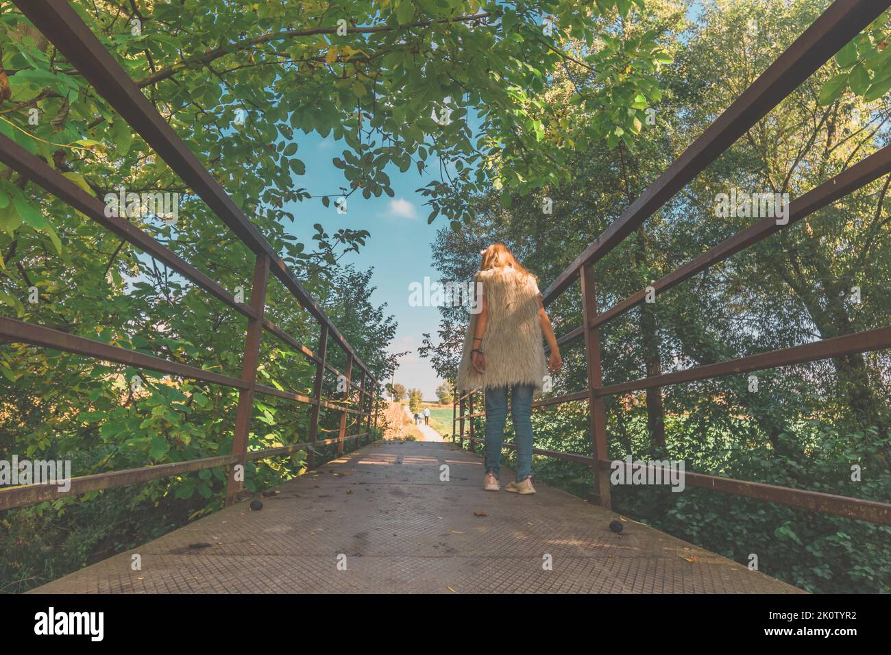 cute teenage girl standing in the bridge Stock Photo - Alamy