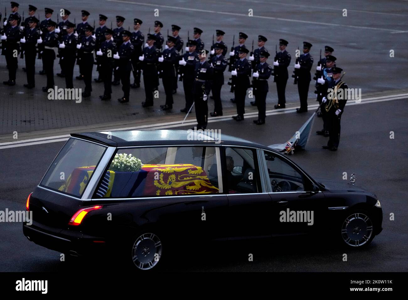 The coffin of Queen Elizabeth II carried in a State Hearse leaving RAF Northolt, west London ...