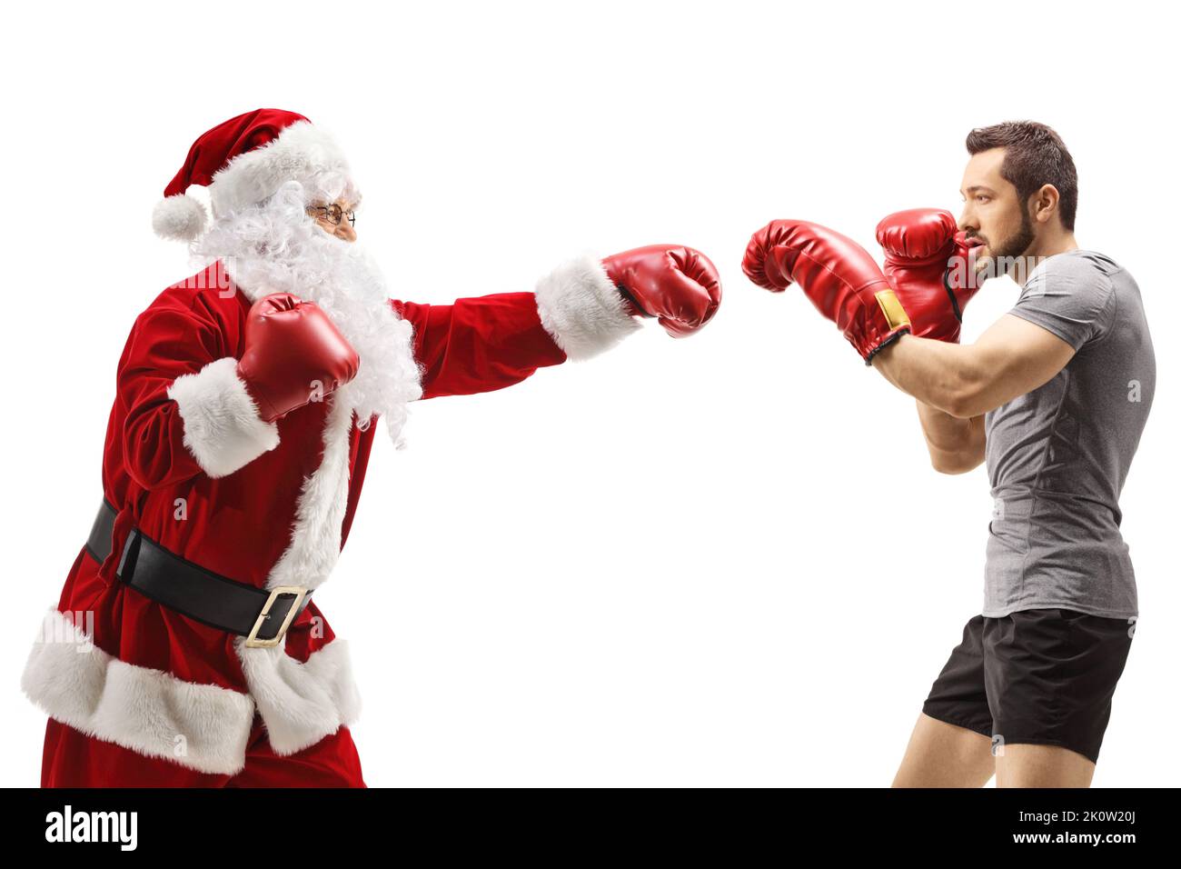 Boxer and santa claus fighting with boxing gloves isolated on white ...