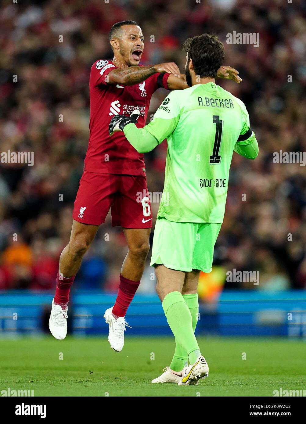 Liverpool's Thiago Alcantara (left) celebrates with Alisson Becker ...