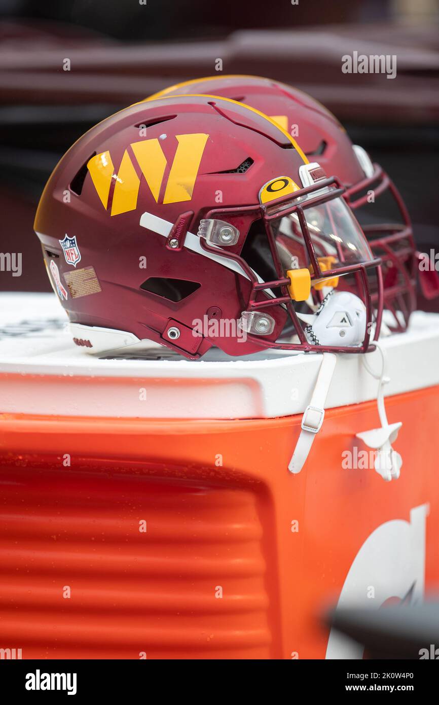 Washington Commanders helmet with new logo is placed on a water cooler ...
