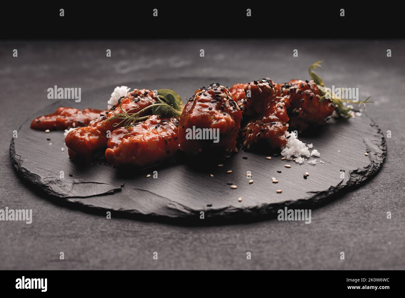 Chili garlic sauce chicken wings hi-res stock photography and images ...