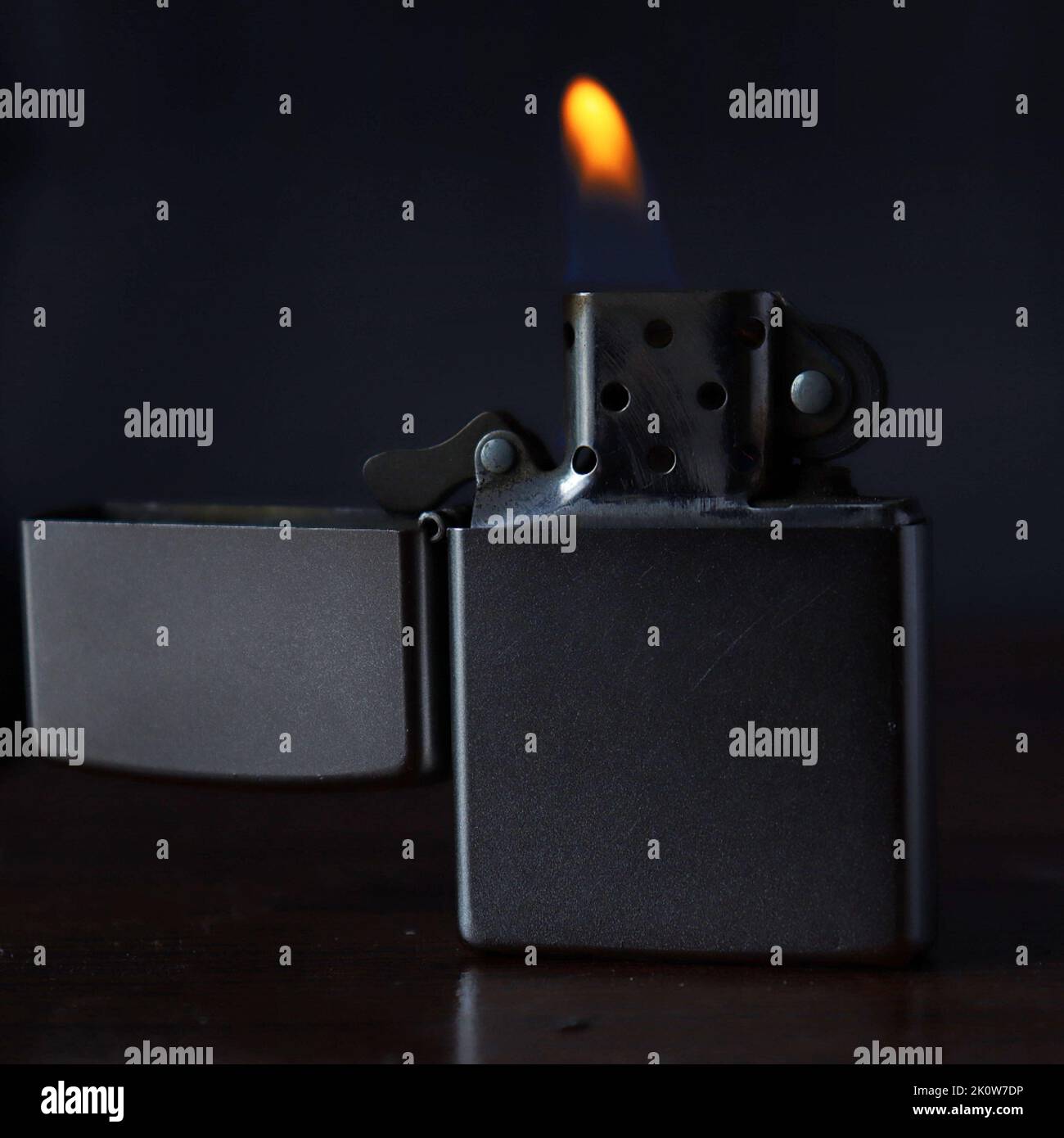 Black metal lighter isolated on black background with clipping path ...