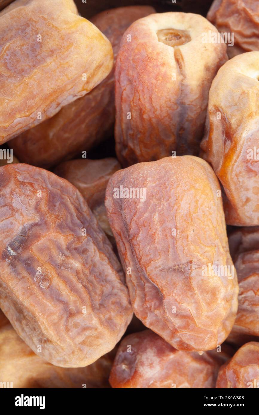 Dates in a wooden bowl on white background. dried dates fruit Stock ...