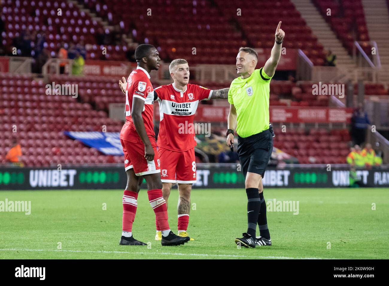 Riley McGree #8 of Middlesbrough argues with Referee James Bell during ...
