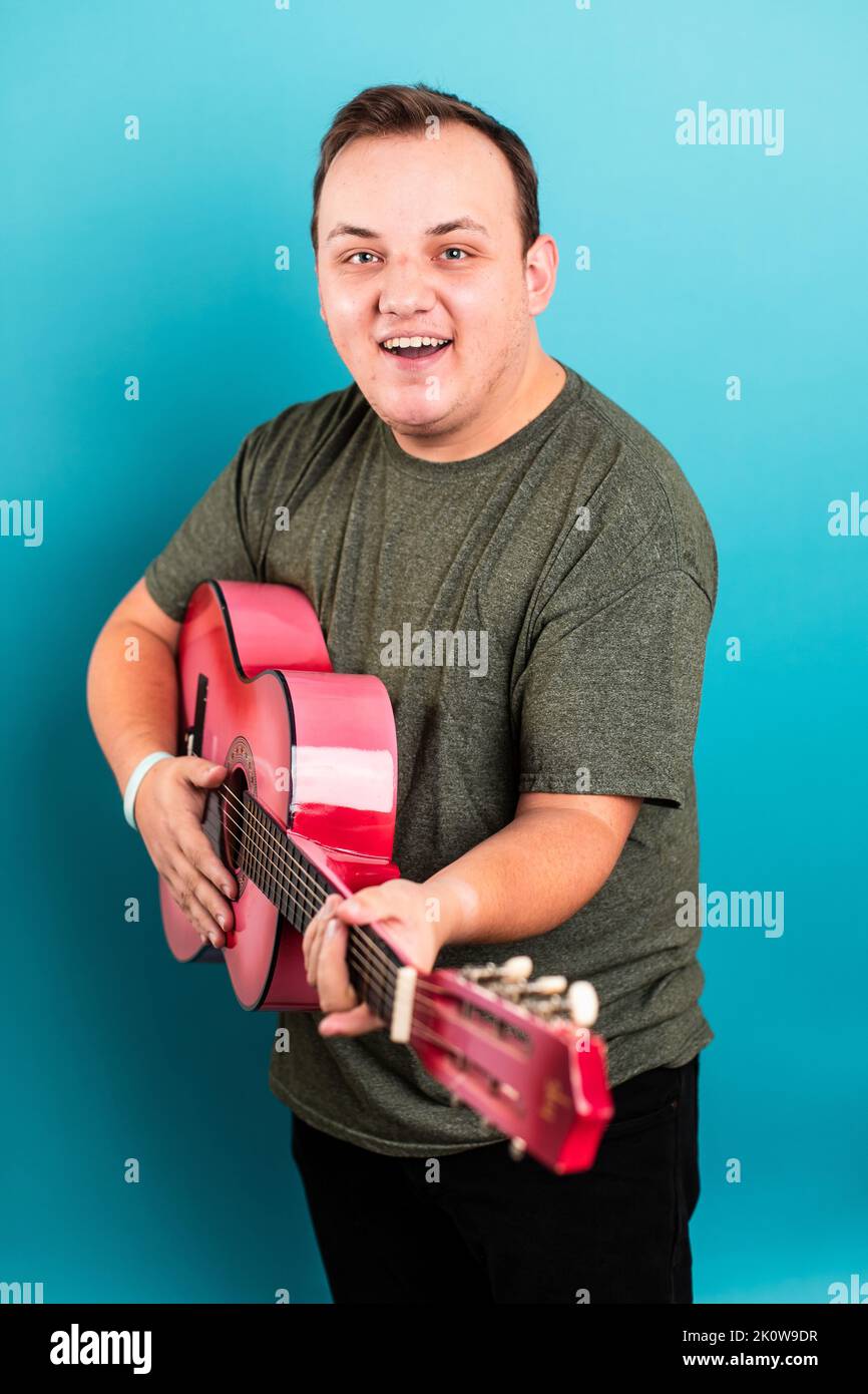 man playing a guitar Stock Photo - Alamy