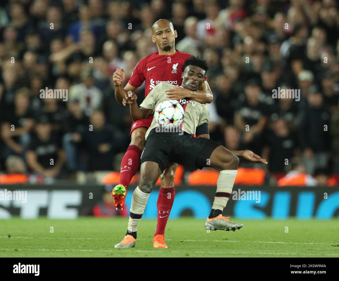 Liverpool, UK. 13th Sep, 2022. Fabinho of Liverpool challenges Mohammed ...