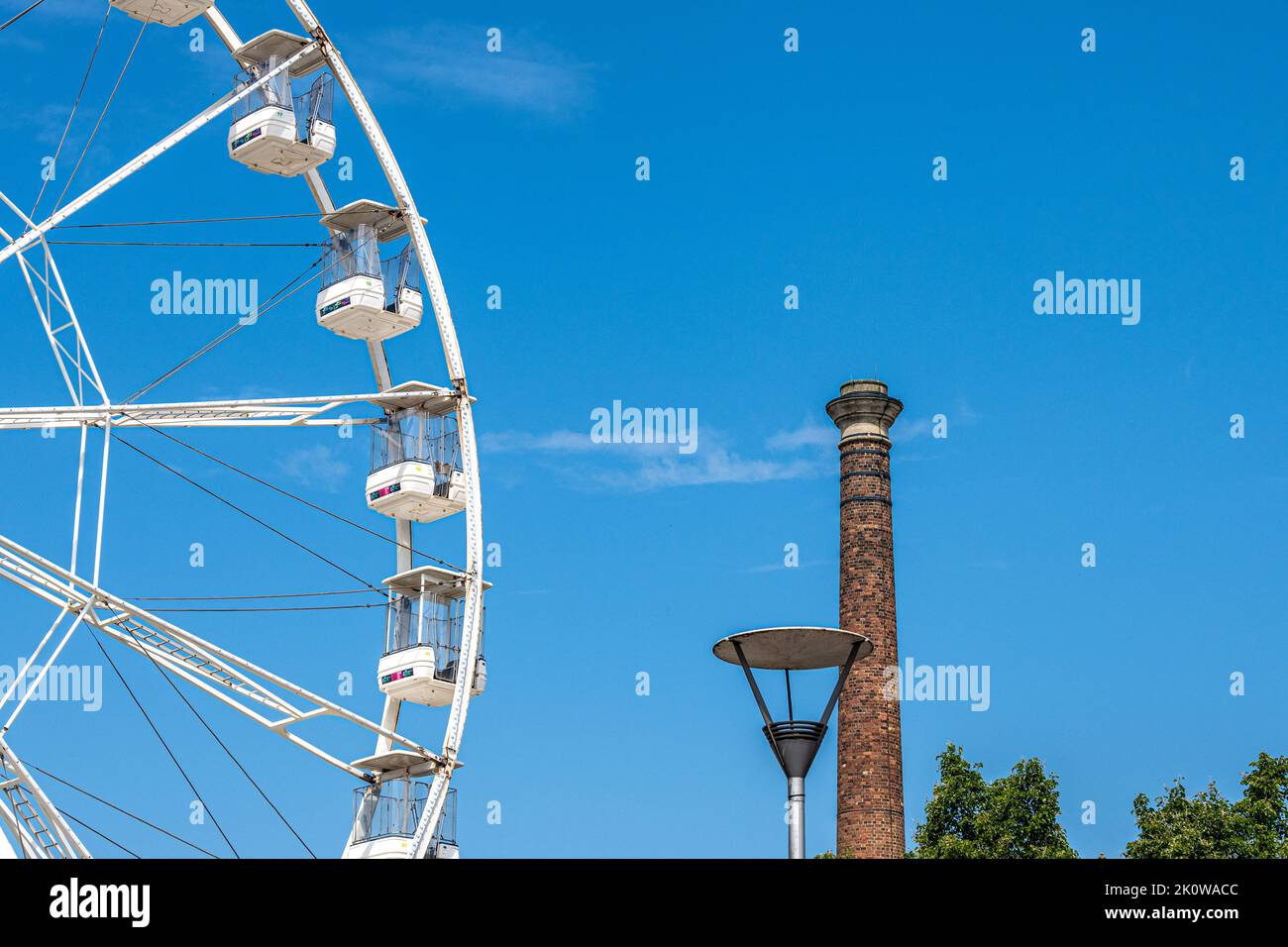 Skyline in Millennium Square with ferris wheel and chimney, Bristol ...