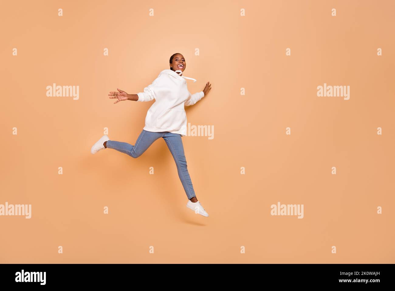 Full length portrait of excited cheerful girl enjoy weekend free time ...