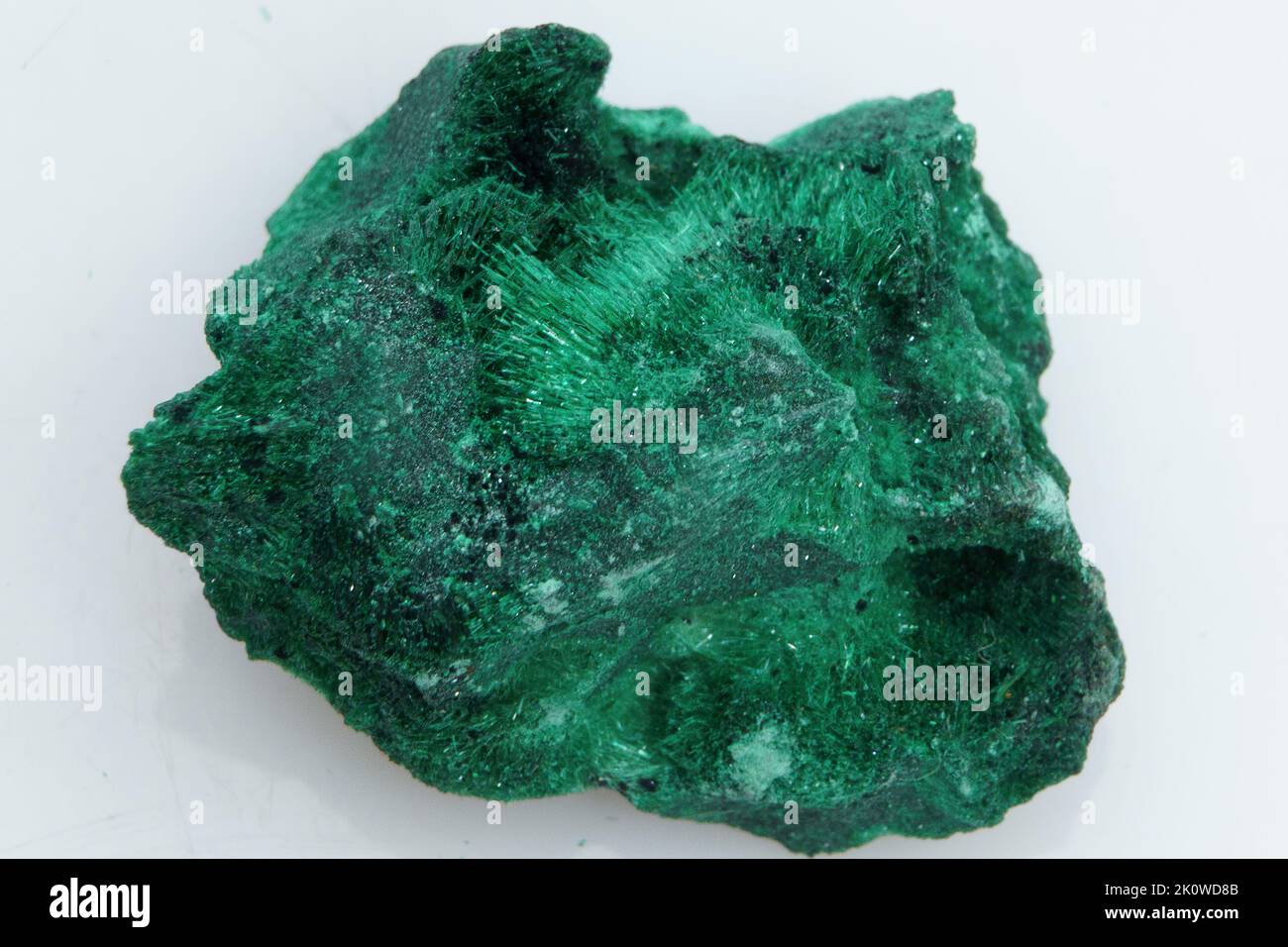 Natural gemstone green malachite on white background Stock Photo - Alamy
