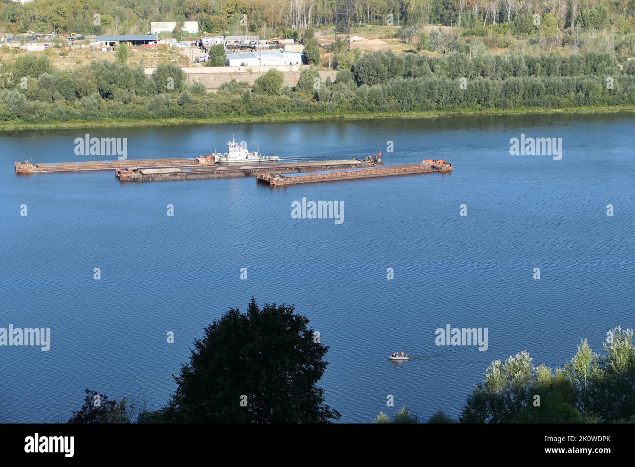 Water transport carrying goods along the river Stock Photo - Alamy