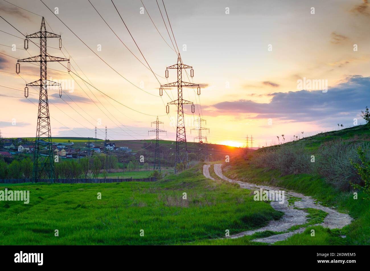 high-voltage power lines at sunset,high voltage electric transmission ...