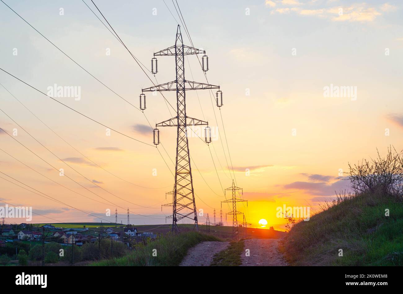 high-voltage power lines at sunset,high voltage electric transmission ...
