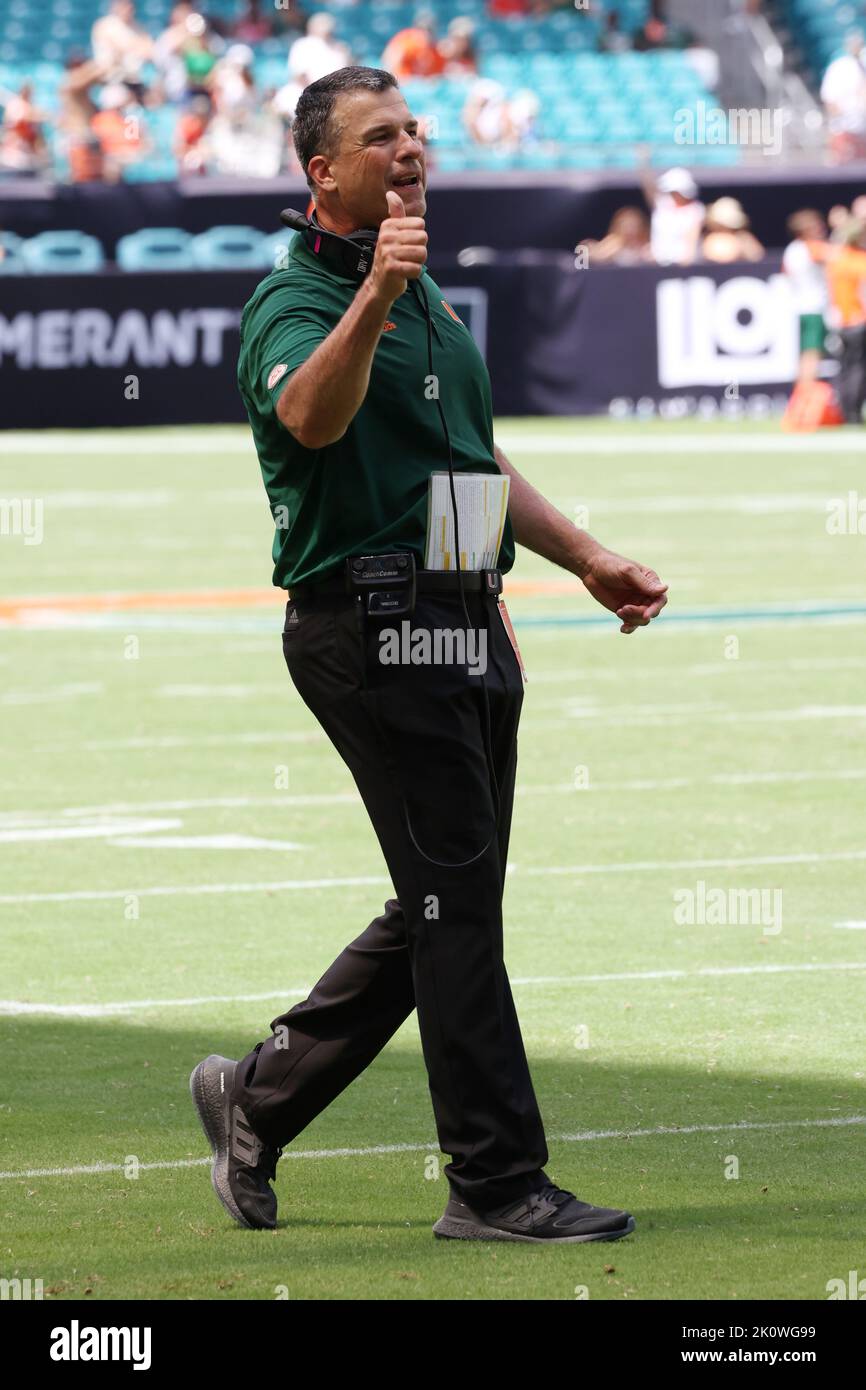 Miami Hurricanes head coach Mario Cristobal gives his approval after a ...