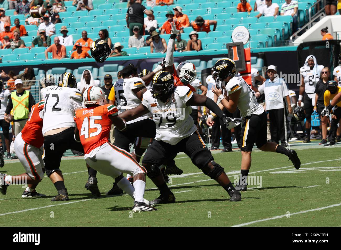 Southern Miss Golden Eagles center Bryce Ramsey (55) loses his helmet ...