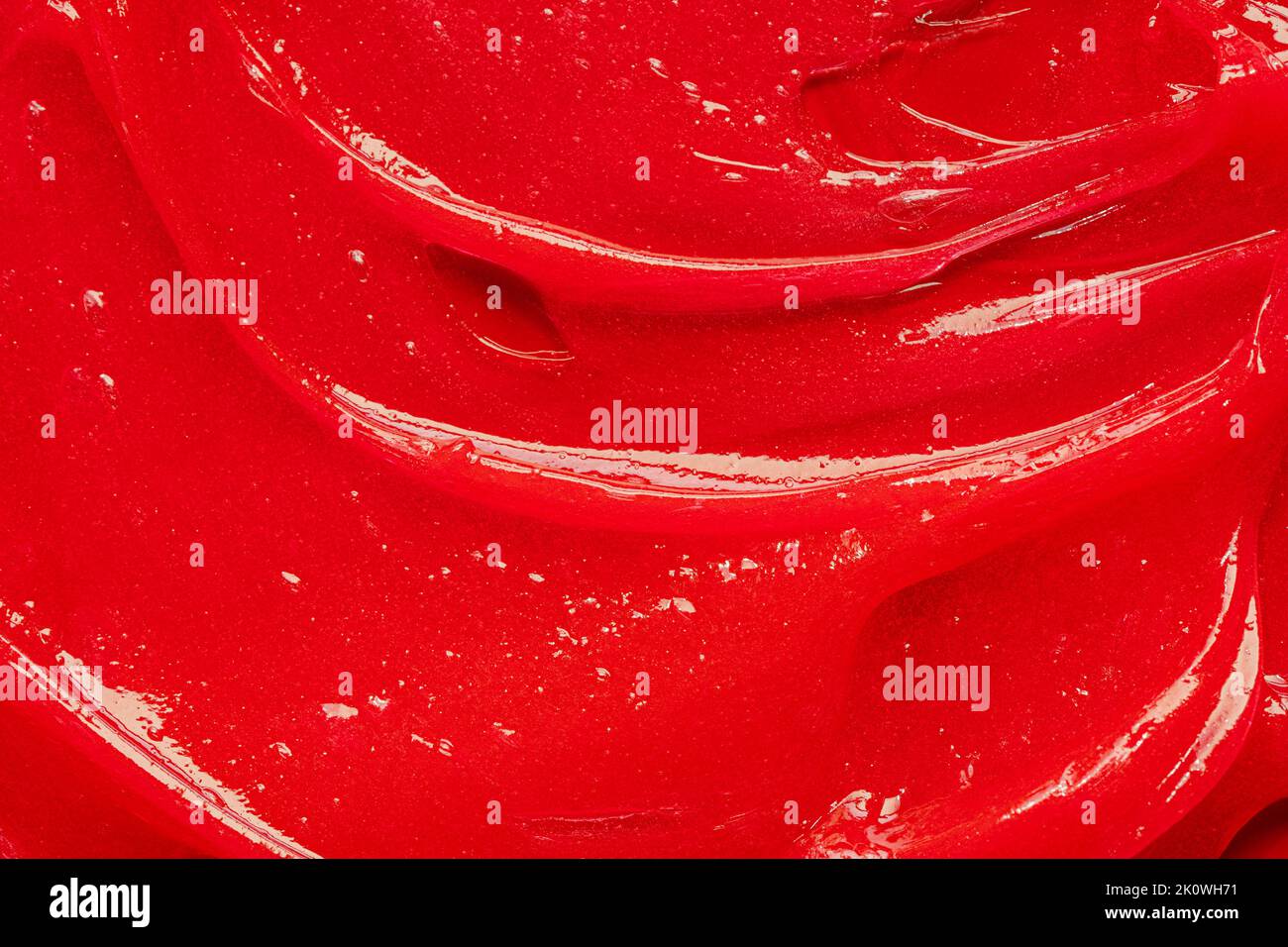 Red gel texture. Cosmetic clear liquid cream smudge. Skin care product ...