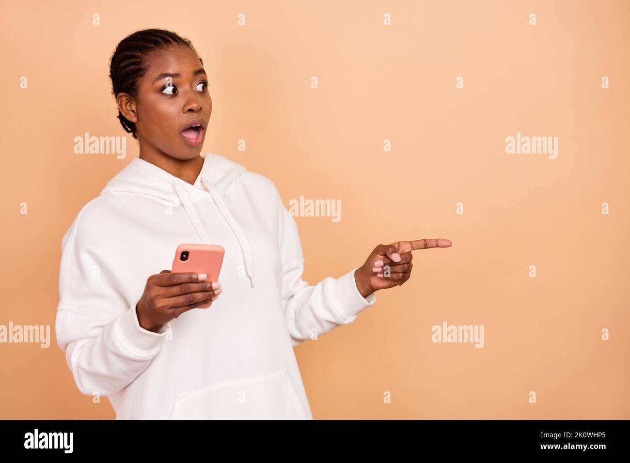 Photo Of Impressed Millennial Braids Hairdo Lady With Telephone Look
