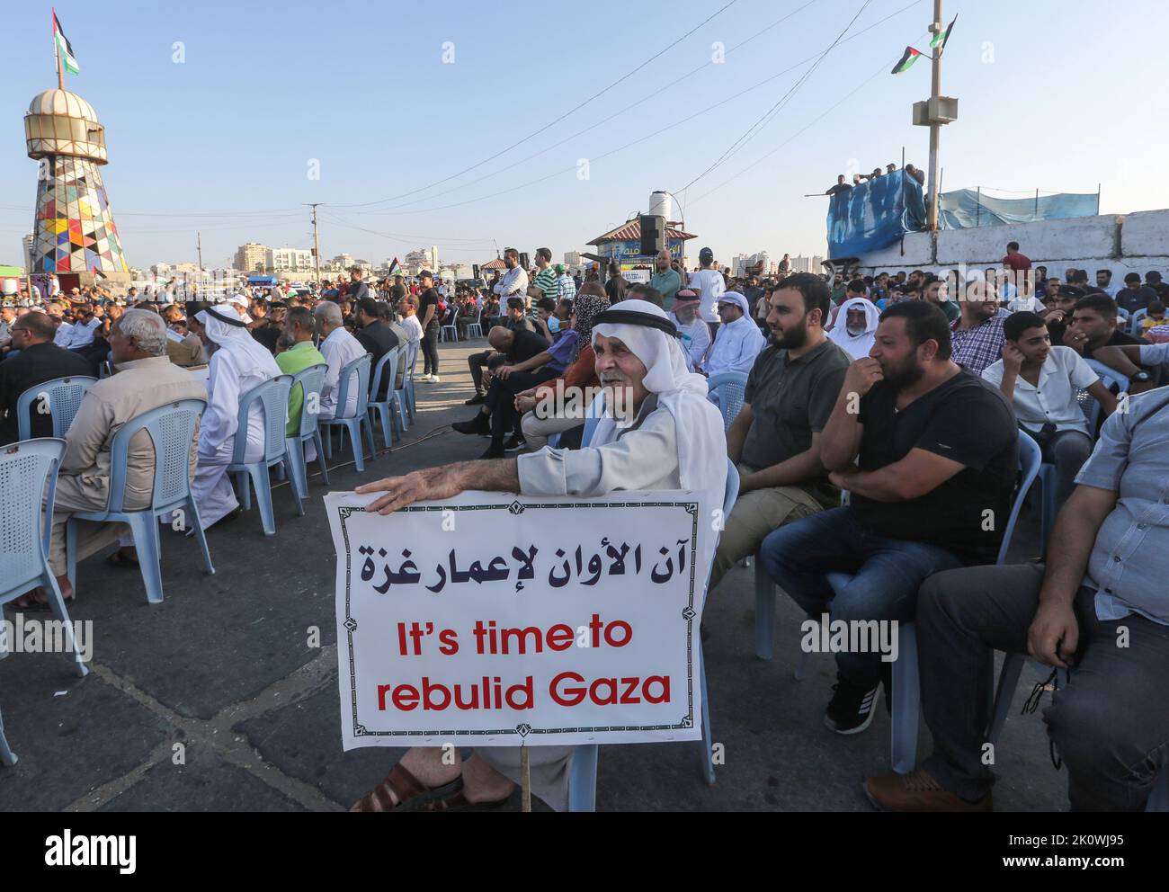 Gaza, Palestine. 13th Sep, 2022. A Palestinian Oldman holds a placard ...