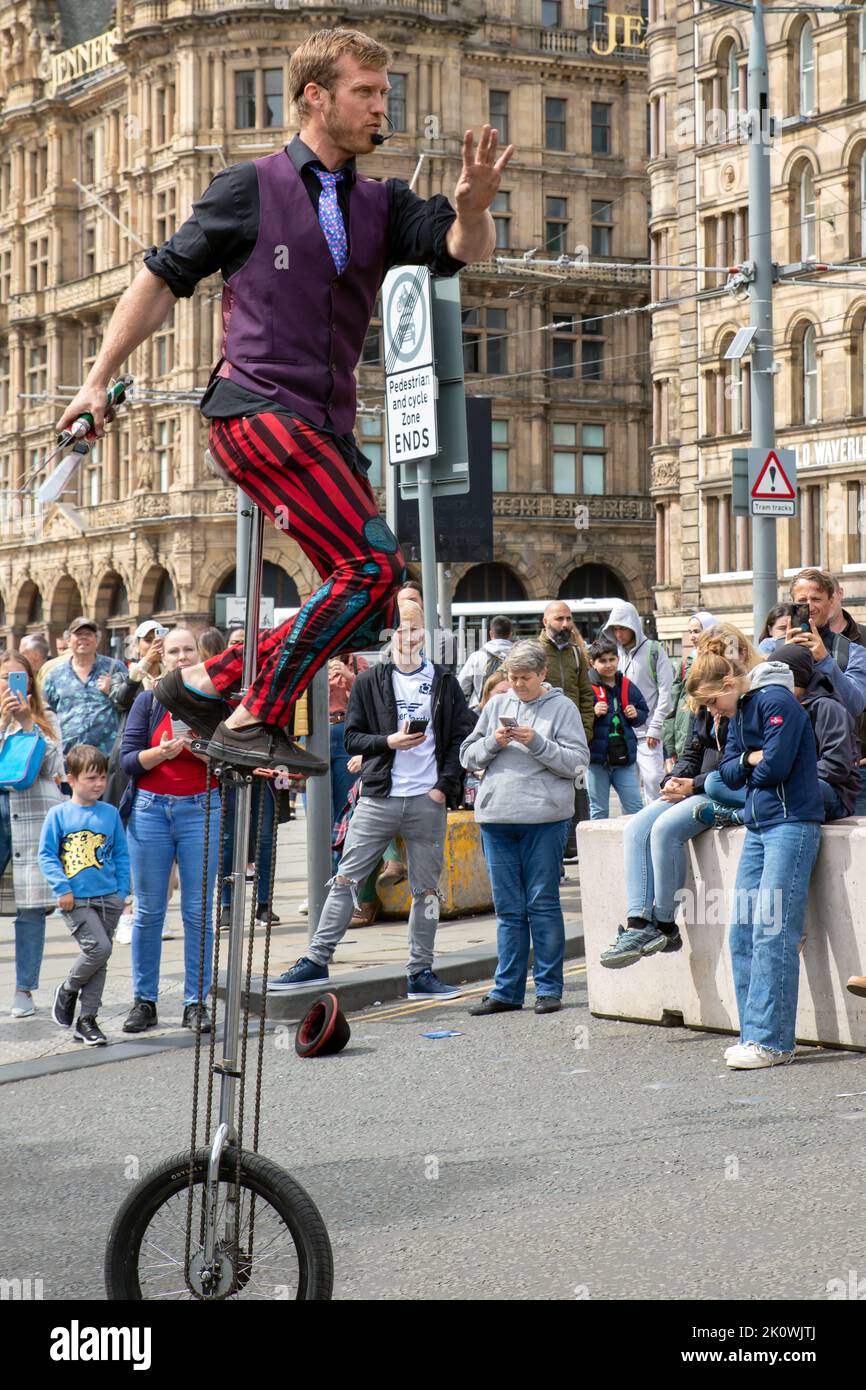 The artist on a on one wheel bike. Edinburgh Festival Fringe 2022- 5 ...