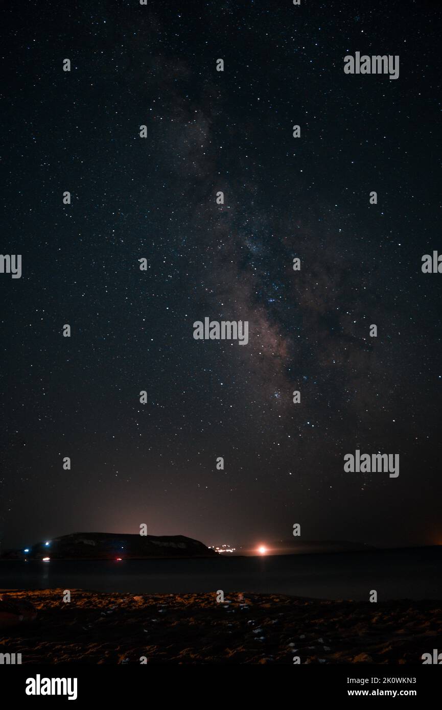 A breathtaking vertical shot of the starry night sky on Elafonisos ...