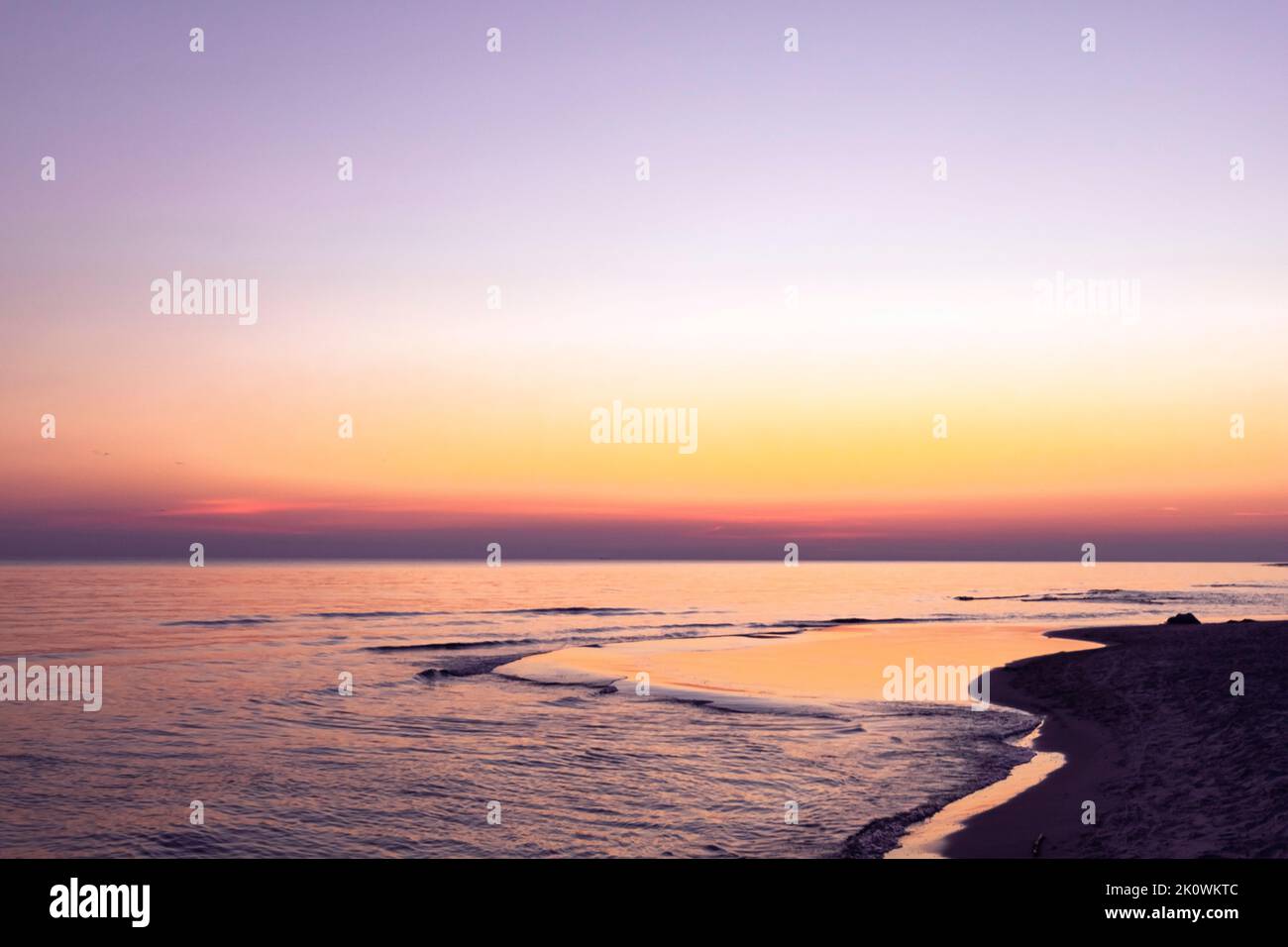 Sunrise beach landscape with light reflections. Scenic seascape with ...