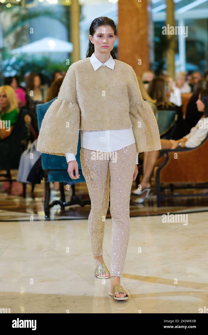 A model walks the runway wearing a creation by The 2nd Skin Co during ...