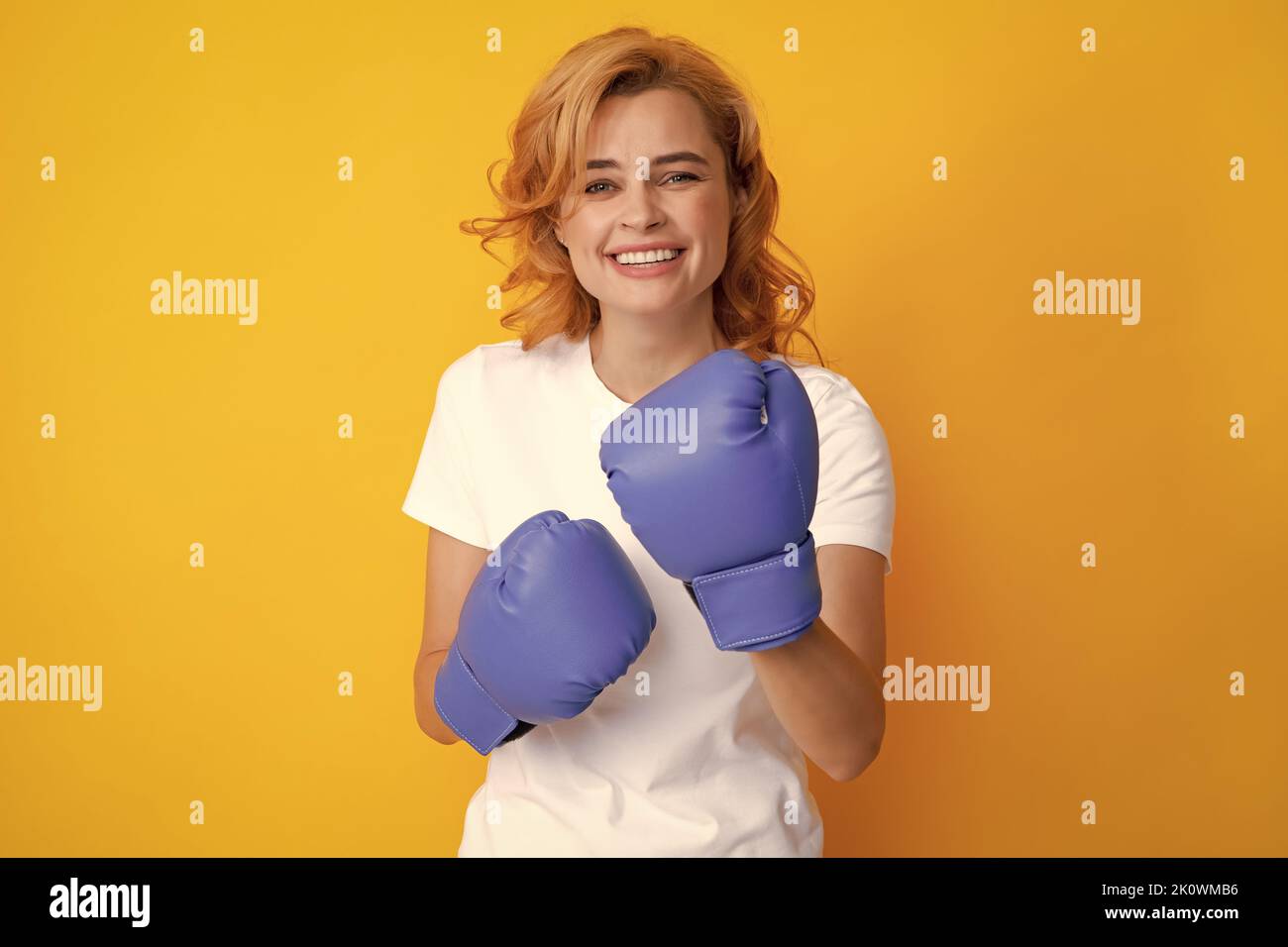 Portrait of successful winner woman in boxing gloves Stock Photo - Alamy