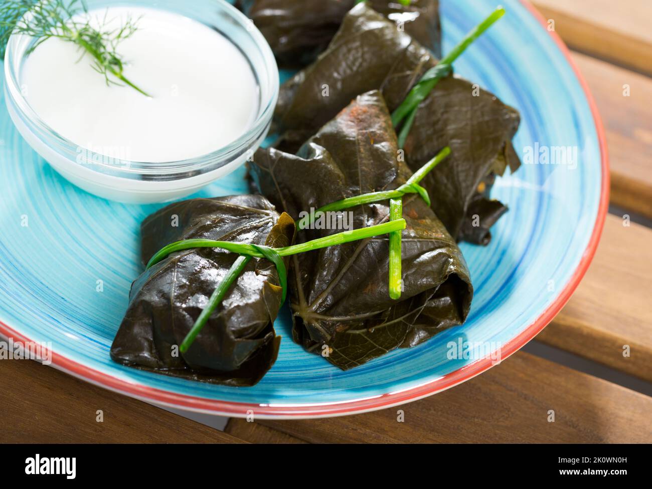 Sarma with sour cream Stock Photo - Alamy