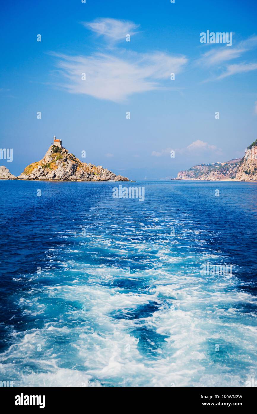Wave trace tails of speed boat on blue water surface in the sea Stock ...